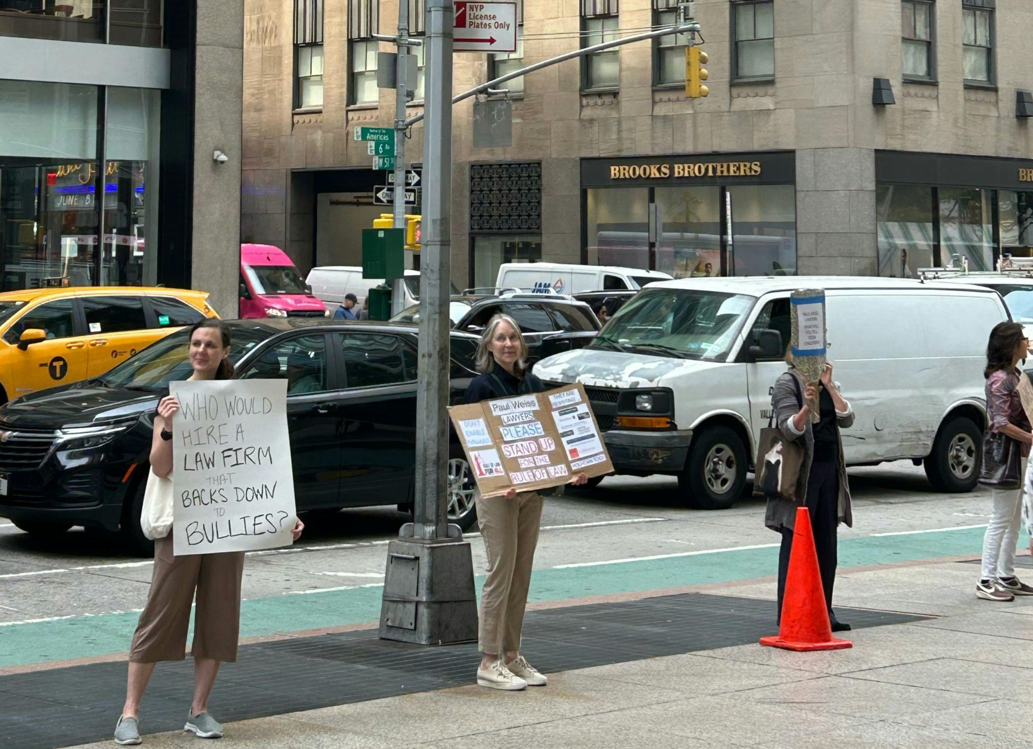 Protesters target Paul Weiss HQ over Trump deal - The Lawyer | Legal ...